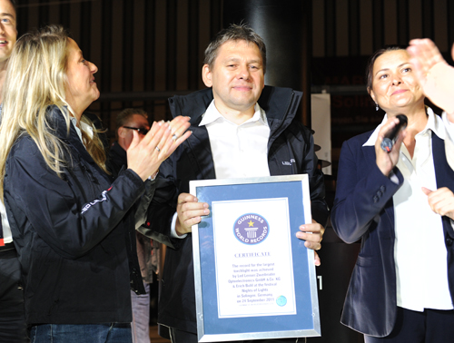 German firm beams its way to largest torchlight record | Guinness World ...