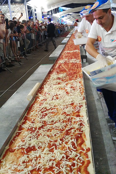 Pizza-makers all over the globe are setting Guinness World Records ...