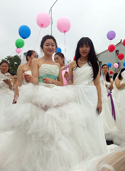 In pictures: Huge gathering of brides break world record in China ...