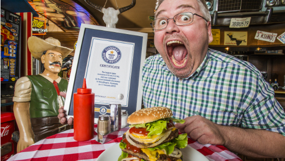 Video: Record holder for largest mouth gape takes a big bite into the ...