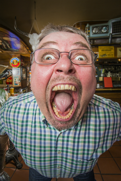 Video: Record holder for largest mouth gape takes a big bite into the ...