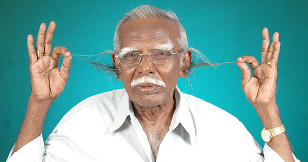 Eighty-one year old Chinese man has longest eyebrow hair in the world | Guinness World Records