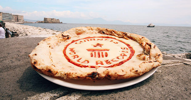 Italian chefs create mile-long Neapolitan to break longest pizza record ...