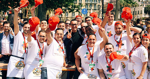Italian chefs create mile-long Neapolitan to break longest pizza record ...