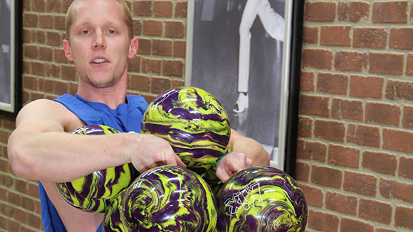 Video: Watch American man attempt to hold 13 bowling balls at same time ...
