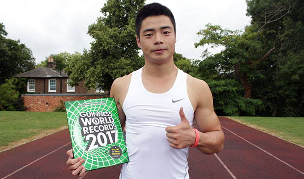 Chinese student walks into Guinness World Records 2017 on his hands ...