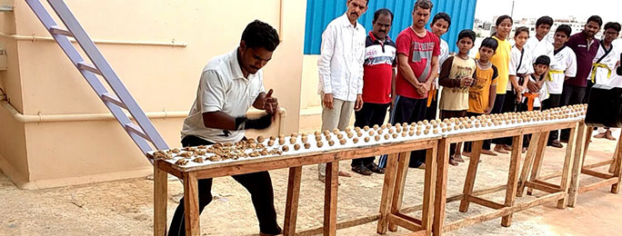 Martial arts master crushes 212 walnuts with his hand for world record ...