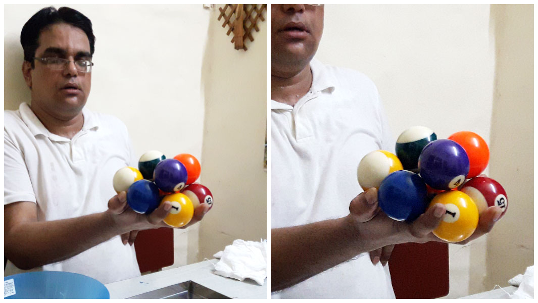 Challenge: Can you beat this record for the most pool balls held in one ...