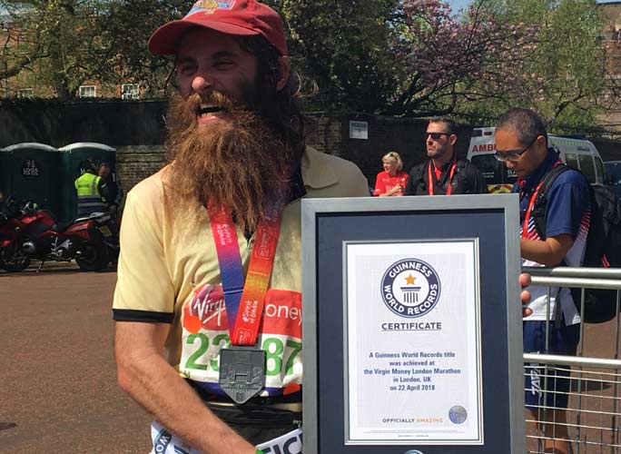 Man dressed as Forrest Gump leads home 34 record breakers at Virgin ...