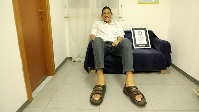 Man with the largest feet talks about his dream as he stars on TV show ...