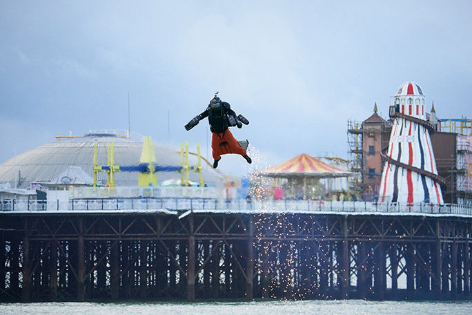 Watch real-life Iron Man smash his jet-powered suit record by flying at ...
