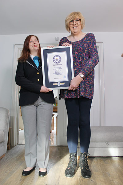 Woman with world's biggest female feet gets her custom-made size 15 ...