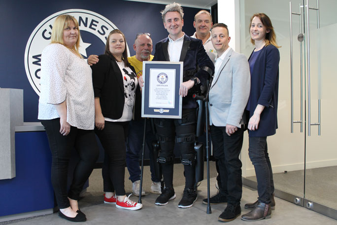 Meet the disabled man who got a robotic walking device then completed a ...