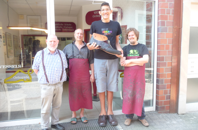 This is the man who makes shoes for the biggest feet in the world ...
