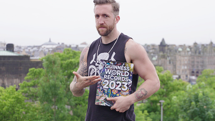 Scottish unicyclist breaks epic powerlifting record | Guinness World ...