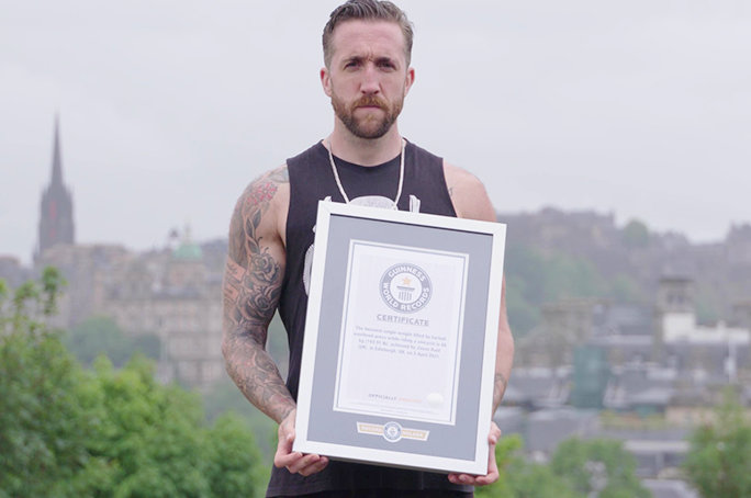 Scottish unicyclist breaks epic powerlifting record | Guinness World ...