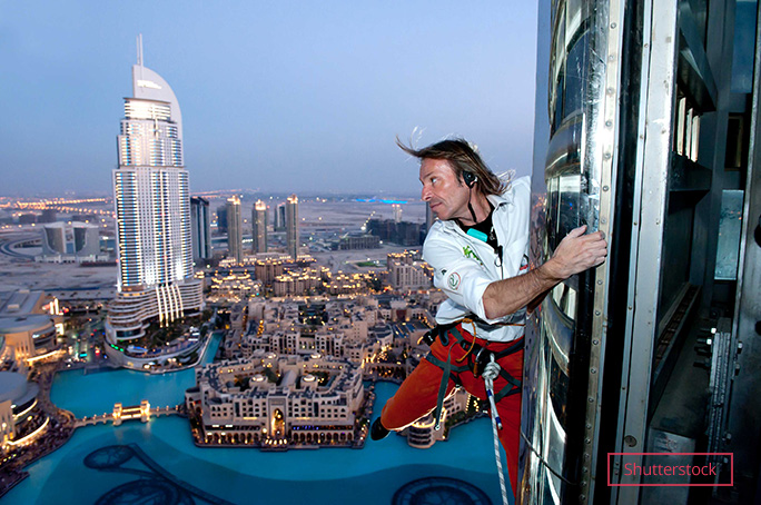 The Real Spider-Man: Alain Robert climbs the world's tallest buildings | Guinness World Records