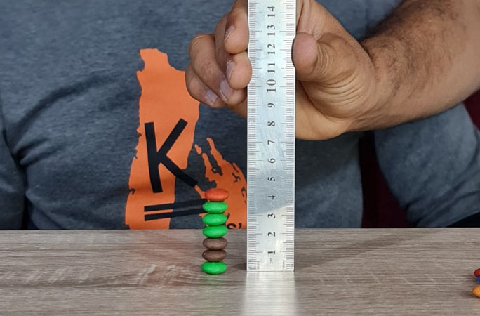 The world's tallest stack of M&M's just got higher | Guinness World Records