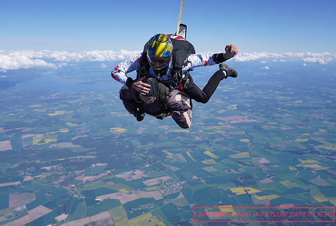103-year-old woman breaks oldest tandem parachute jump record ...