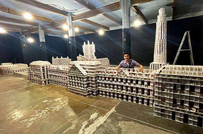 Teen stacks 143,000 playing cards to create world’s largest card ...
