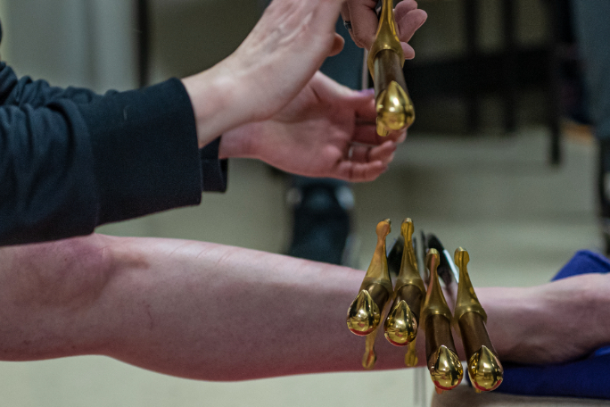 Belly dancer daringly balances 30 swords on her body in just one minute ...