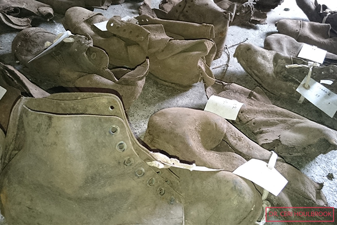 Bizarre discovery of single shoes concealed in wall likely used to ward ...
