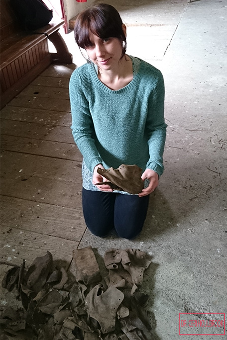 Bizarre discovery of single shoes concealed in wall likely used to ward ...