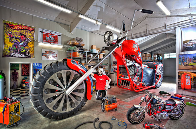 Motorcycle as tall as a giraffe and heavy as an elephant is still fully ...