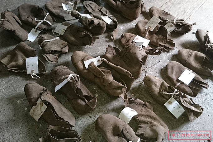 Bizarre discovery of single shoes concealed in wall likely used to ward ...