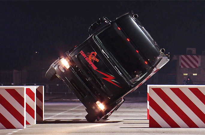 Stuntman sets record driving HGV on side wheels through extremely ...
