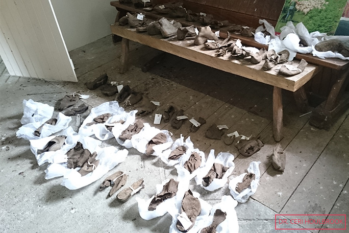 Bizarre discovery of single shoes concealed in wall likely used to ward ...