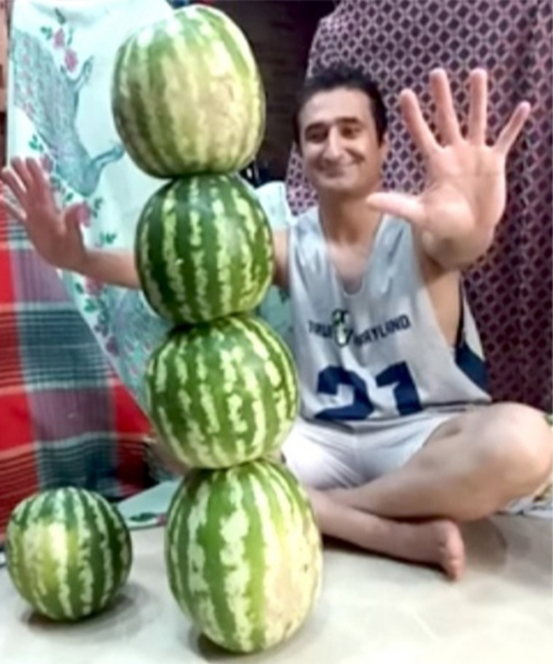 Iranian university professor stacks four watermelons to set record ...