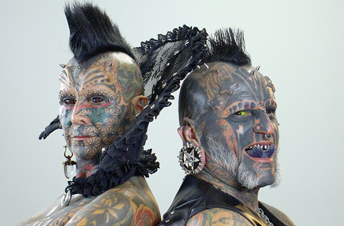 “We are artists”: Married couple with 91 body modifications extend ...