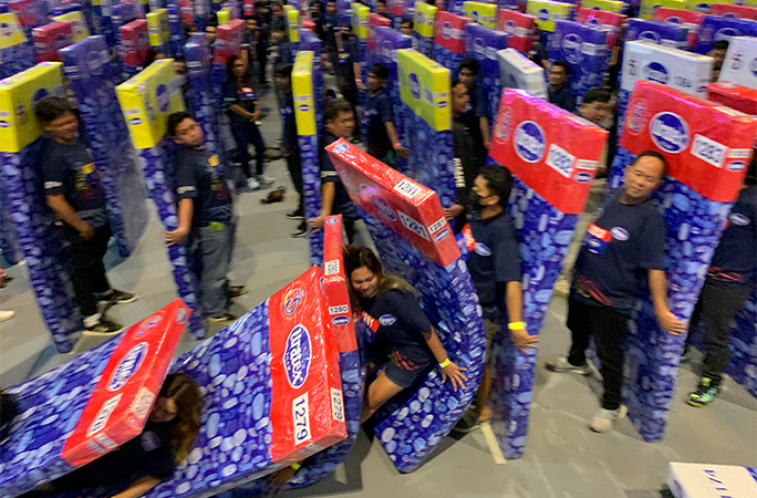 Human mattress dominoes record toppled by 2,355 people in Philippines ...