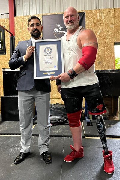 Man who lost leg in horror crash that 'killed' him breaks record with ...