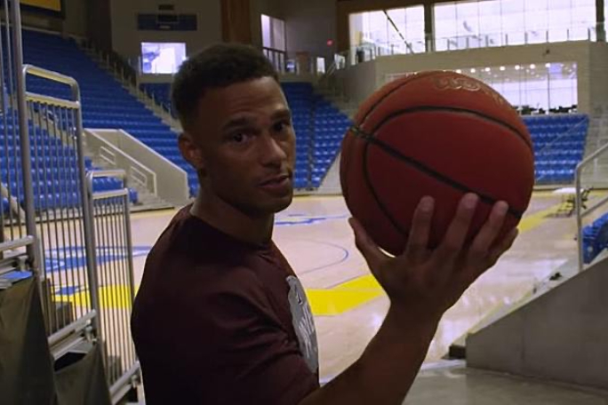 Basketball fanatic shoots ball an unbelievable 113 feet and makes it in ...