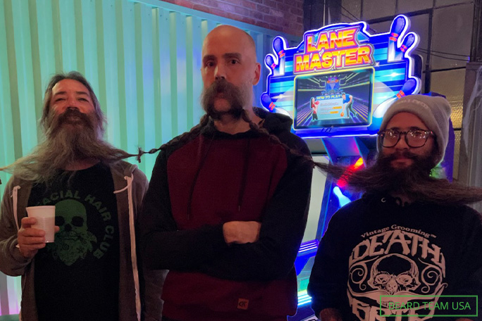 69 men come together to form world’s longest beard chain | Guinness ...