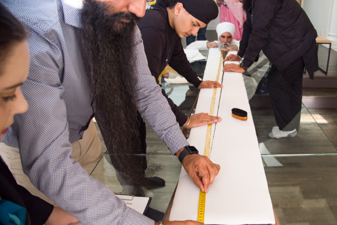 Man with the world's longest beard grows famous facial hair even longer ...