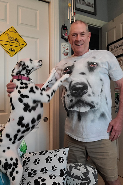 Dalmatian-mad dad sees spots everywhere thanks to record-breaking ...