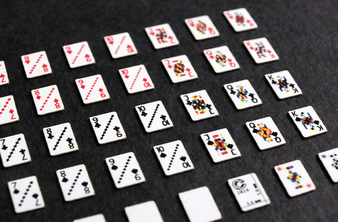 Deck of rice-sized playing cards certified as smallest ever made ...