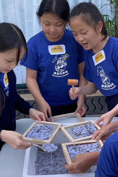 Chinese children turn panda poo into paper during record-breaking ...
