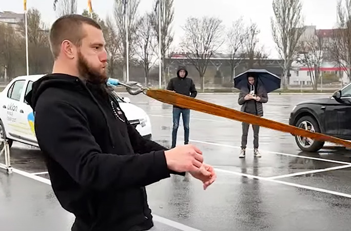 Ukrainian strongman pulls 2.5-tonne minibus with beard to set world ...