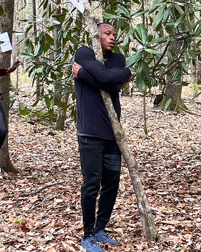 Ghanaian activist hugs over 1,100 trees in an hour to set record ...
