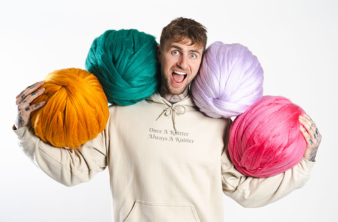 Tattooed TikTok star arm knits blankets for 24 hours straight to raise ...