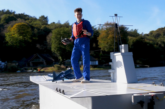 YouTuber lands plane on world’s largest RC aircraft carrier to set ...