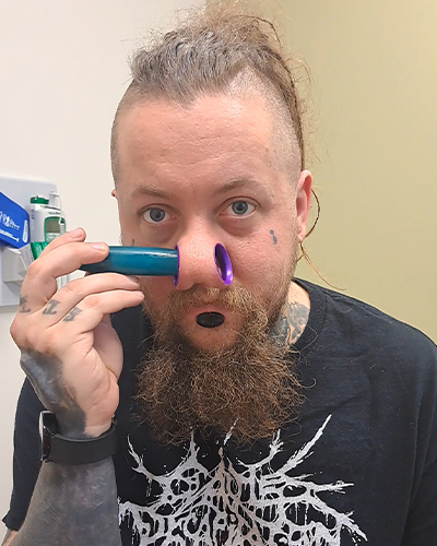 USA man with flesh tunnel through entire nose did it “to see how far I ...