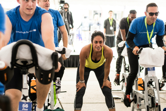 Static cyclists raise record-breaking total for those with disabling ...