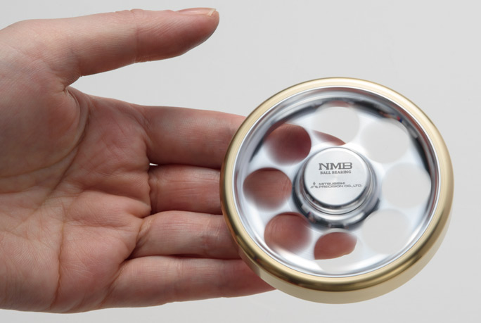 Video: World’s smallest fidget spinner is so tiny it will easily fit on ...