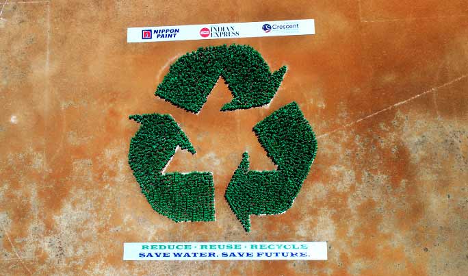 1,726 people form giant human recycling logo for record attempt in ...