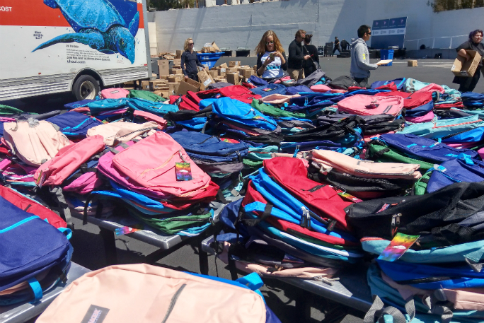 Schoolchildren benefit as more than 1,500 backpacks full of supplies ...